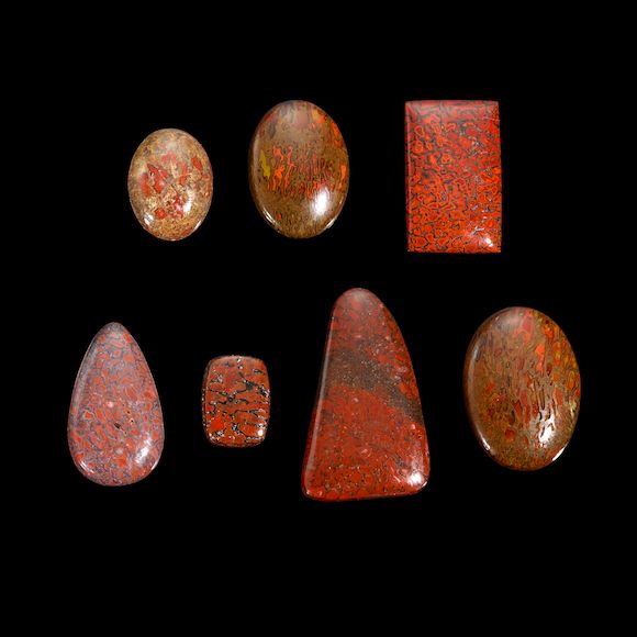 Bonhams : Seven Red Dinosaur Bone Cabochons