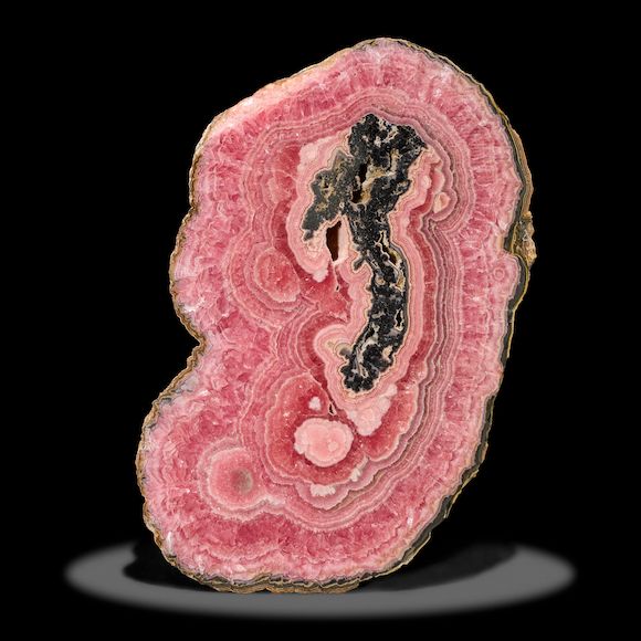 Bonhams : Rhodochrosite Stalactite Cross-section Slab
