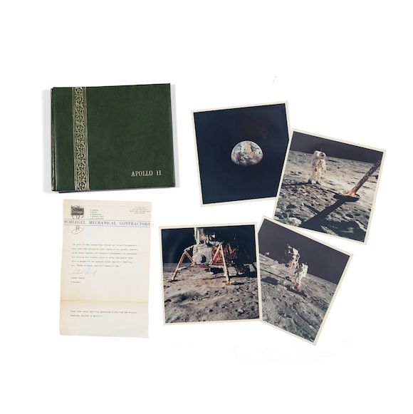Bonhams : APOLLO 11 PHOTO ALBUM Containing 4 color photographs, 8 x 8 ...