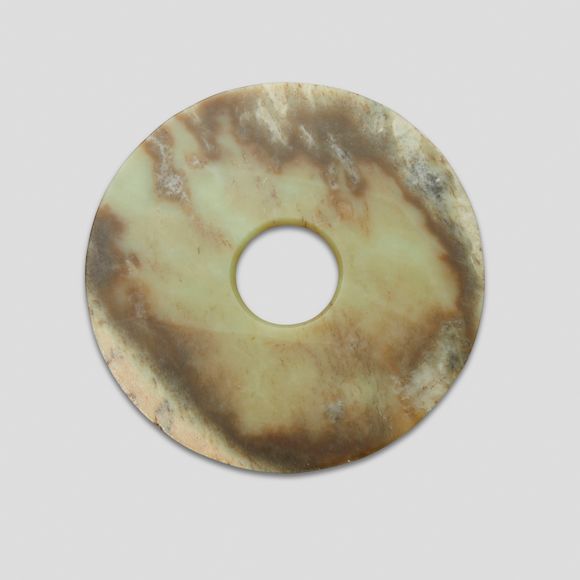 Bonhams : A large Neolithic-style jade bi disc