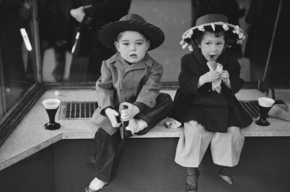 Bonhams : Ruth Orkin (1921-1985); Two small kids with hats at the ...