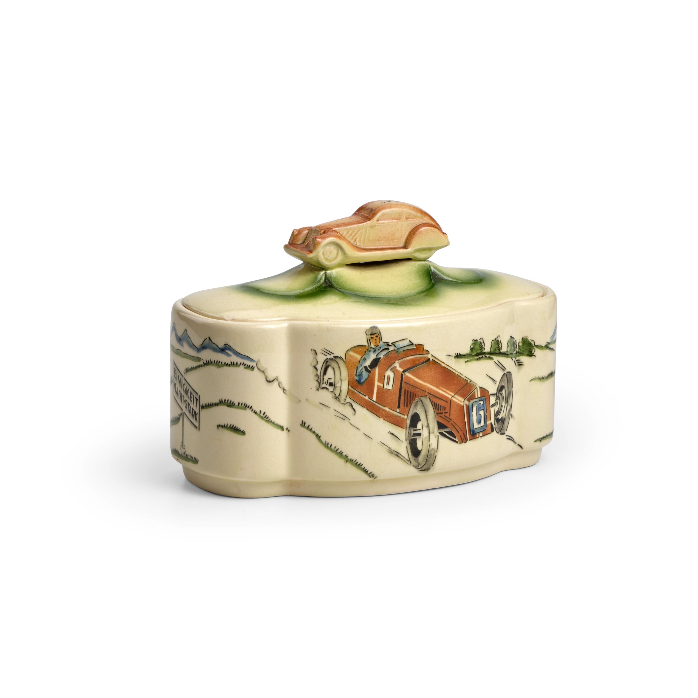 Bonhams Cars : A LARGE CERAMIC CANDY JAR WITH AUTOMOBILE ON LID BY ...