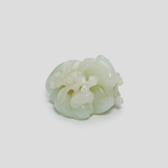 Bonhams : A VERY PALE WHITISH-CELADON JADE 'DOUBLE RAM' GROUP 20th century