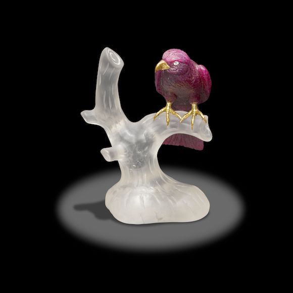 Bonhams : Ruby Carving of a Falcon on Rock Crystal Quartz Base