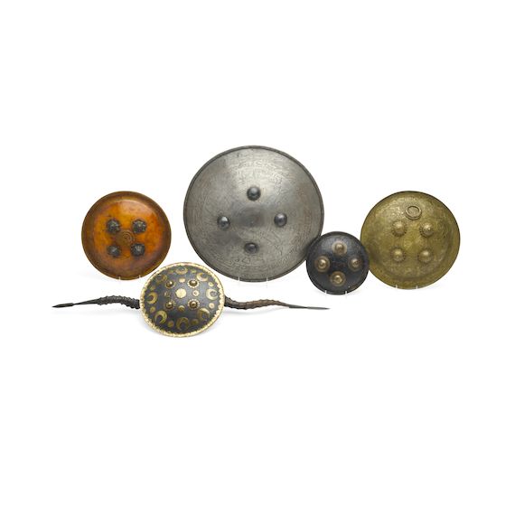 Bonhams : FIVE ASIAN METAL SHIELDS