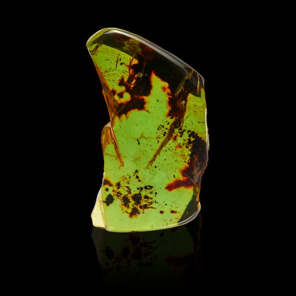 Bonhams : Rare Green Amber Specimen