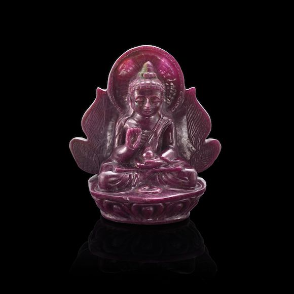 Bonhams : Ruby Carving of a Seated Buddha