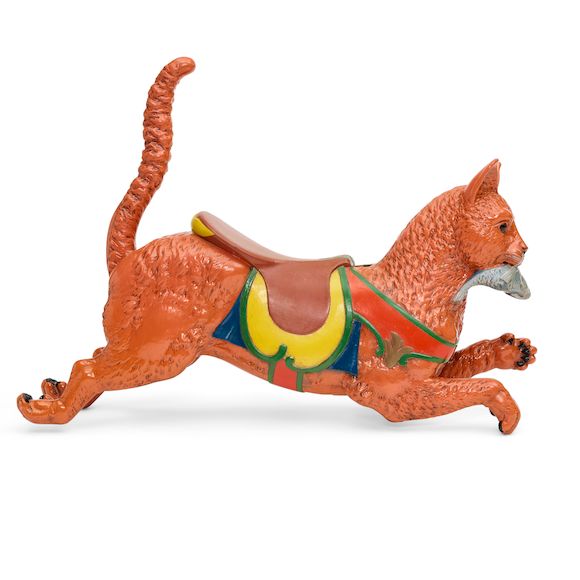Bonhams : A CARVED AND PAINTED CAROUSEL CATAttributed to the Dentzel ...