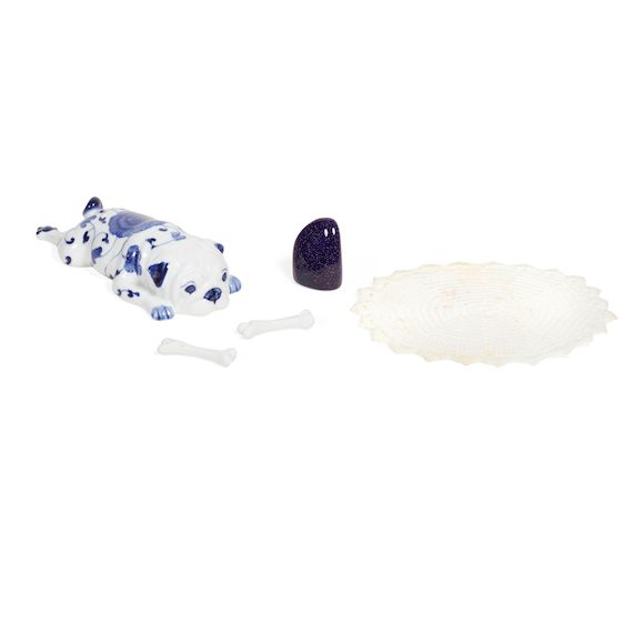 Bonhams : A RUTH BADER GINSBURG PORCELAIN PUG DOG, CRYSTAL AND DOILY. A ...