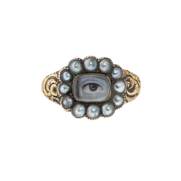 Bonhams Skinner : AN ANTIQUE GOLD AND EYE MINIATURE RING