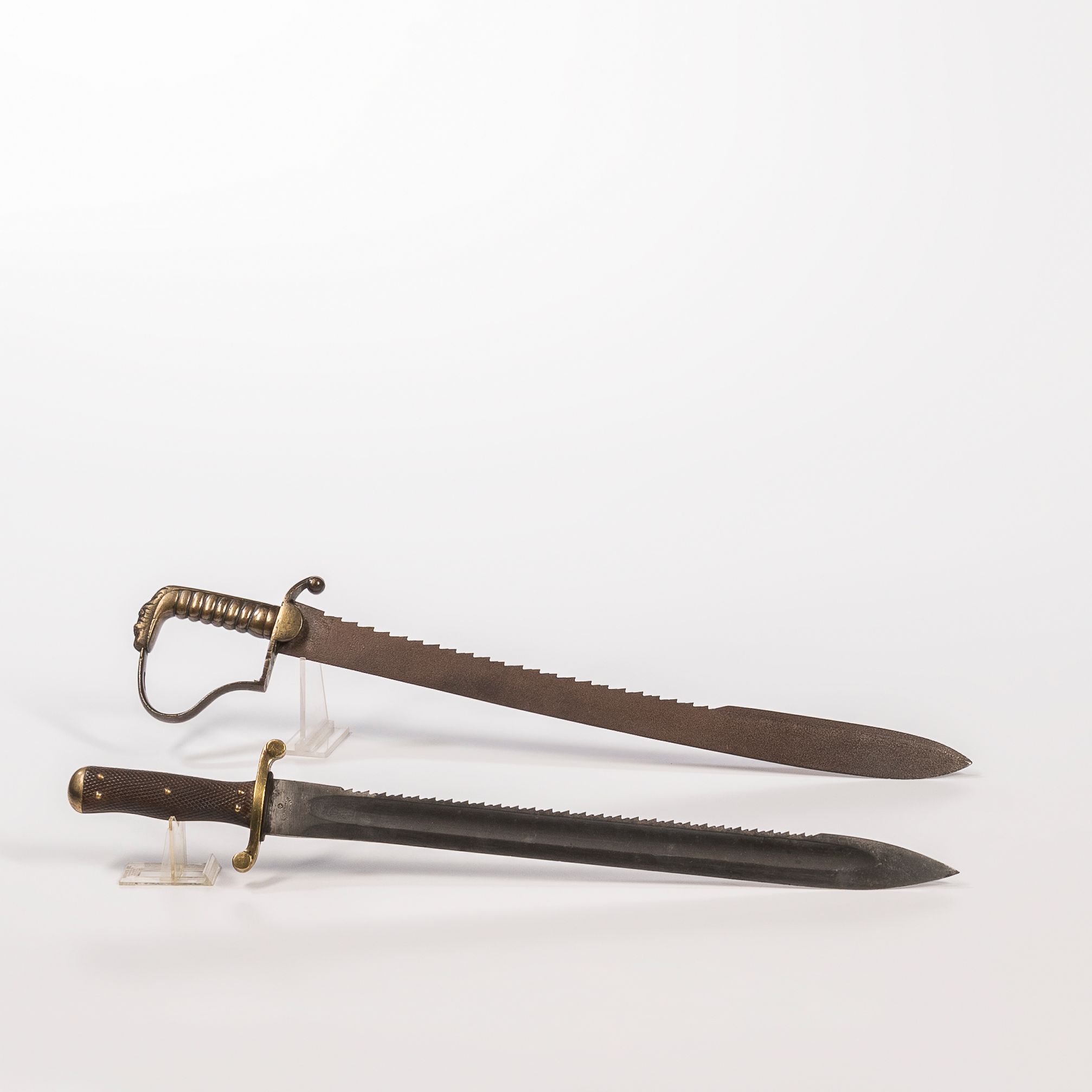 Bonhams Skinner : Swiss Model 1875 Pioneer Saw Back Sword and British ...