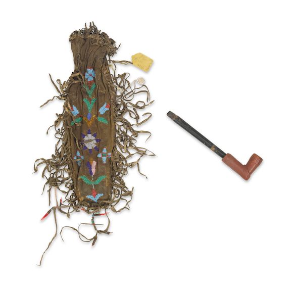 Bonhams : An Apsáalooke (Crow) beaded pipe bag and pipe