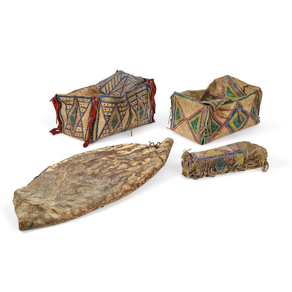 Bonhams : Four Lakota (Sioux) parfleche or rawhide items