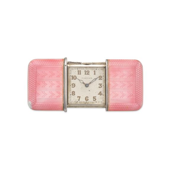 Bonhams : CARTIER. A RARE STERLING SILVER AND ENAMEL CONCEALED TRAVEL ...