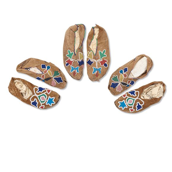 Bonhams : Three pairs of Báxoje (Iowa) moccasins