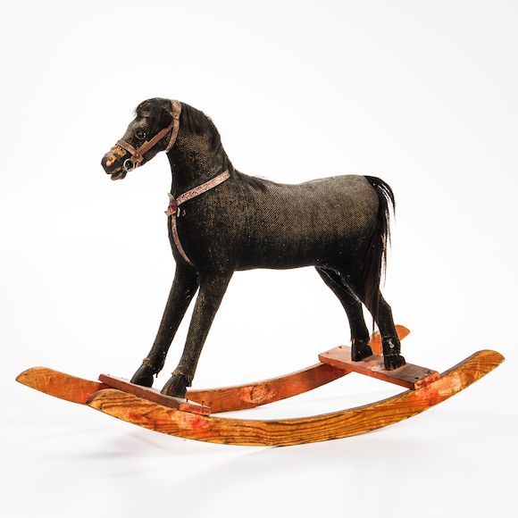 Bonhams Skinner : Black Stuffed Rocking Horse