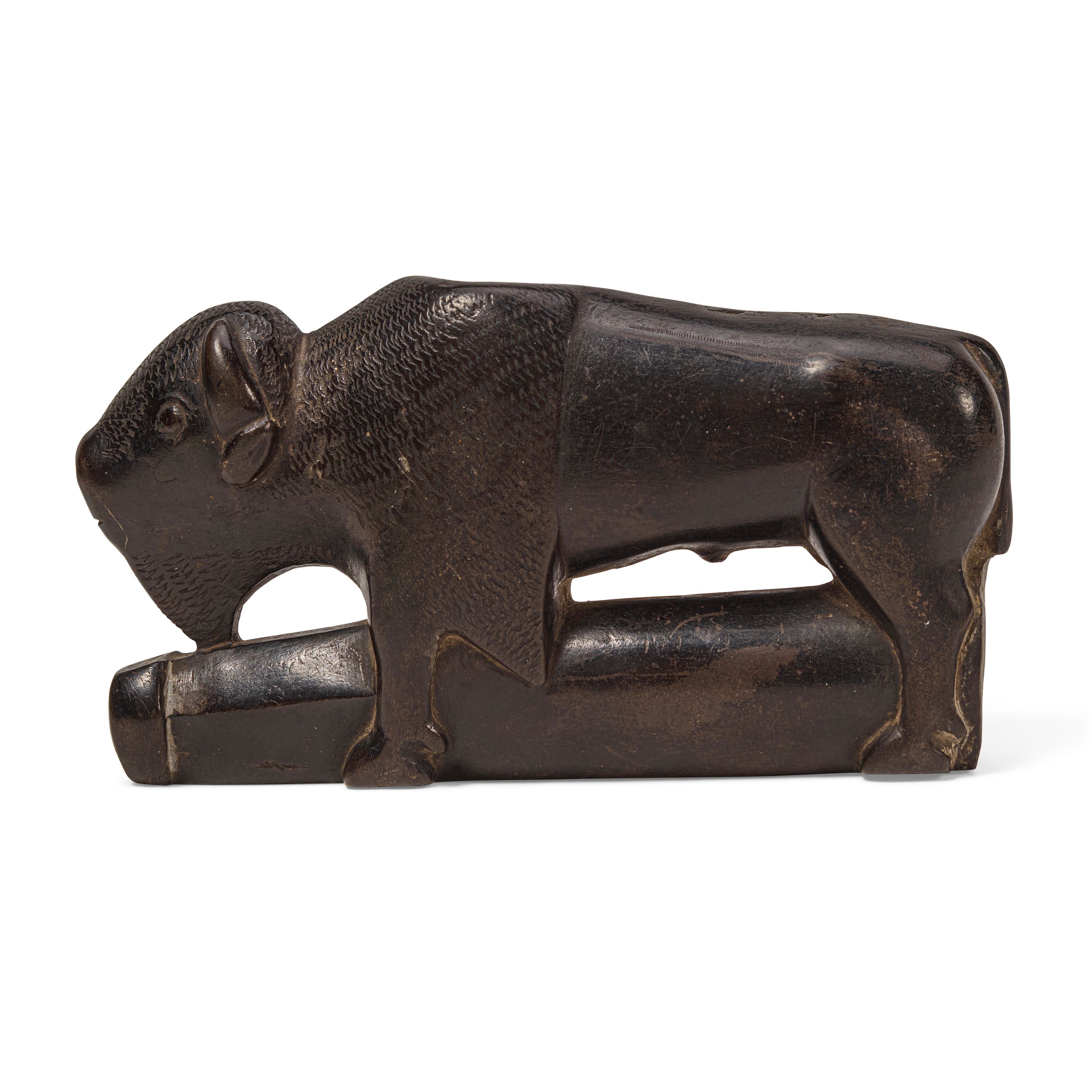 Bonhams : A Ponca pipestem with buffalo effigy bowl