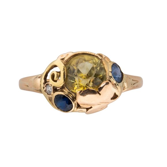 Bonhams Skinner : EDWARD OAKES: AN ARTS & CRAFTS GOLD GEM-SET RING