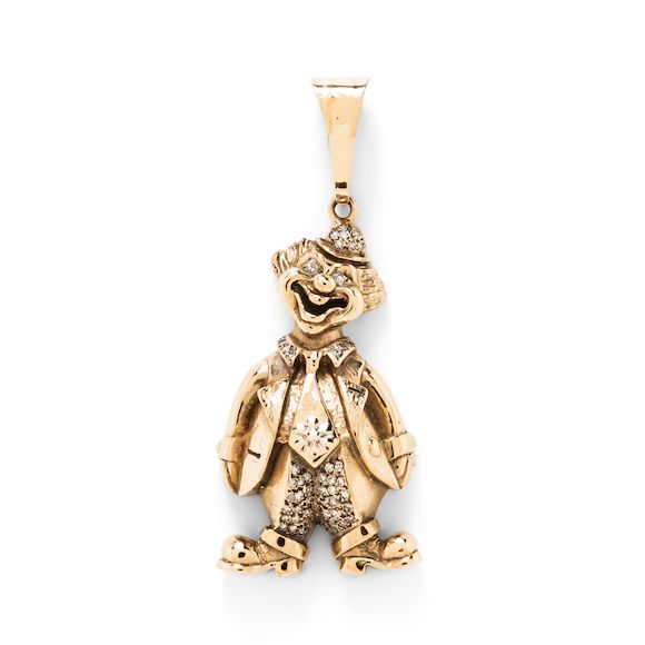 Bonhams Skinner : A GOLD AND DIAMOND CLOWN PENDANT