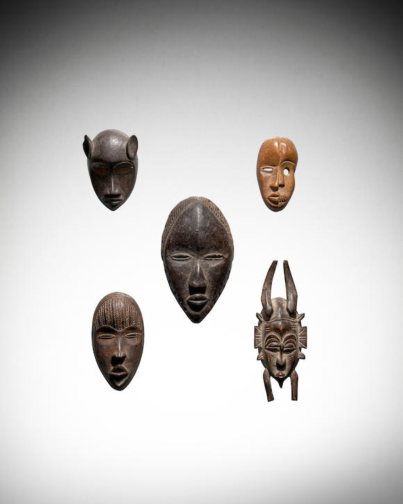 Bonhams Group Of Five Passport And Clan Masks Liberiacôte Divoire
