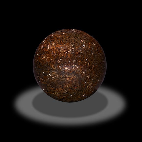 Bonhams : Red Dinosaur Bone Sphere