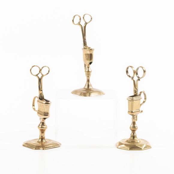 Bonhams Skinner : Three Early Brass Snuffers and Stands, England, c. 1760.