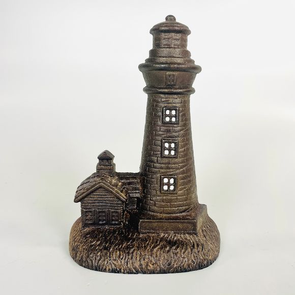 Bonhams Skinner : Reproduction Cast Iron Lighthouse Doorstop