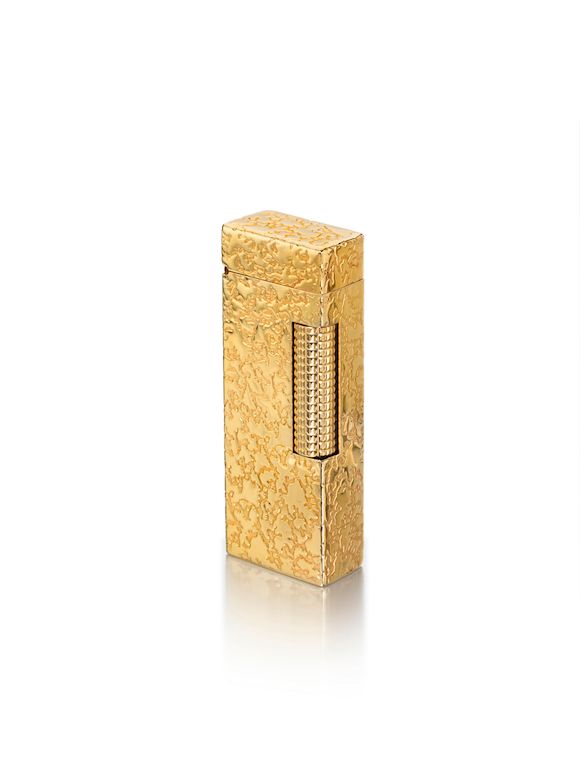 Bonhams : DUNHILL: A 14K GOLD LIGHTER