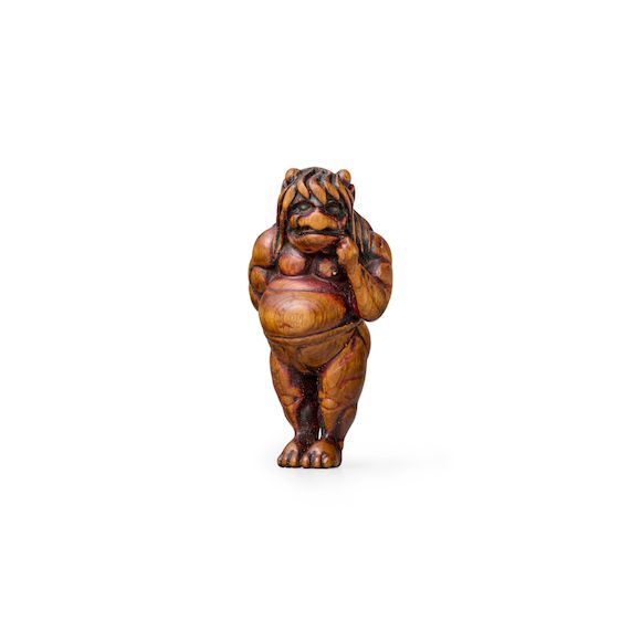 Bonhams : A WOOD NETSUKE OF AN ONI (DEMON) Edo period (1615-1868), 18th ...