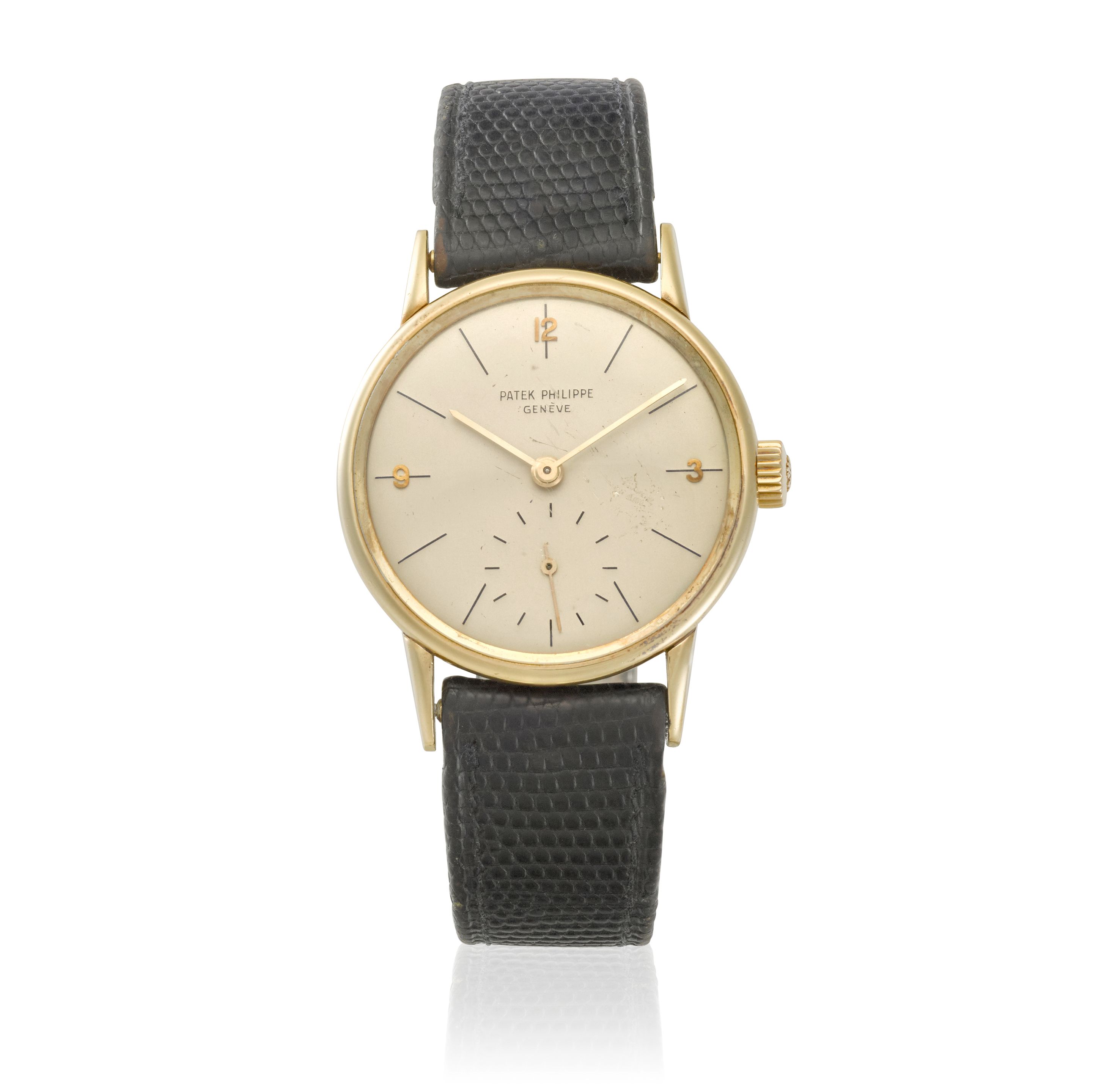 Bonhams : PATEK PHILIPPE. AN 18K GOLD MANUAL WIND WRISTWATCH Calatrava ...