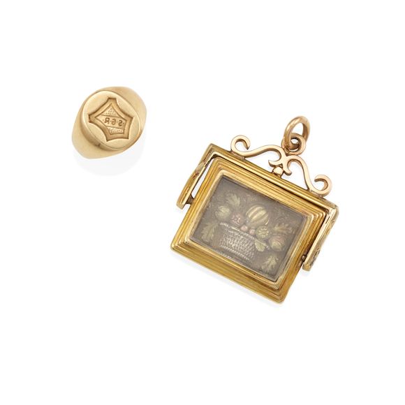 Bonhams : A TRI-COLORED GOLD AND CARNELIAN FOB TOGETHER WITH A GOLD RING
