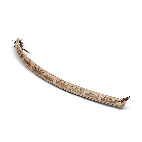 Bonhams Skinner : An Eskimo engraved bow drill lg. 16 3/4 in.