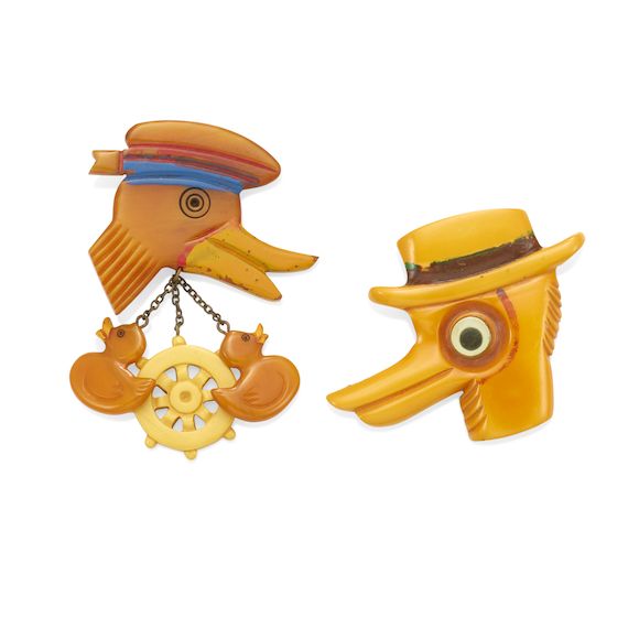 Bonhams : TWO HAND-PAINTED DUCK HEAD BAKELITE BROOCHES one with hat and ...