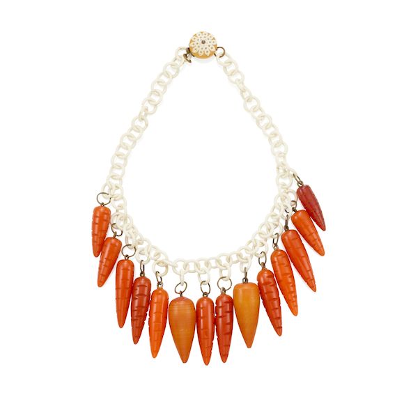 Bonhams : A 14 CARROT BAKELITE NECKLACE on a celluloid chain with 14 ...