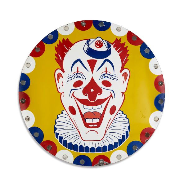 Bonhams : A CIRCULAR ENAMELED METAL CLOWN SIGN mid 20th centurydiameter ...