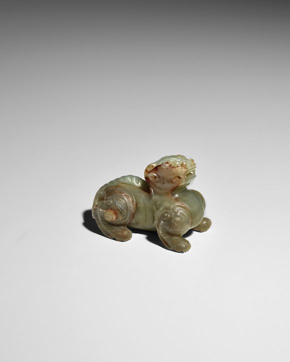 Bonhams : A JADE FIGURE OF A RECUMBENT BEAST, BIXIE Six Dynasties