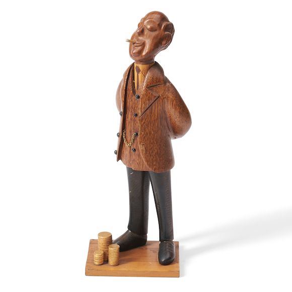 Bonhams Skinner : Carved and Assembled Figure of a Banker, Italy, c. 1930.