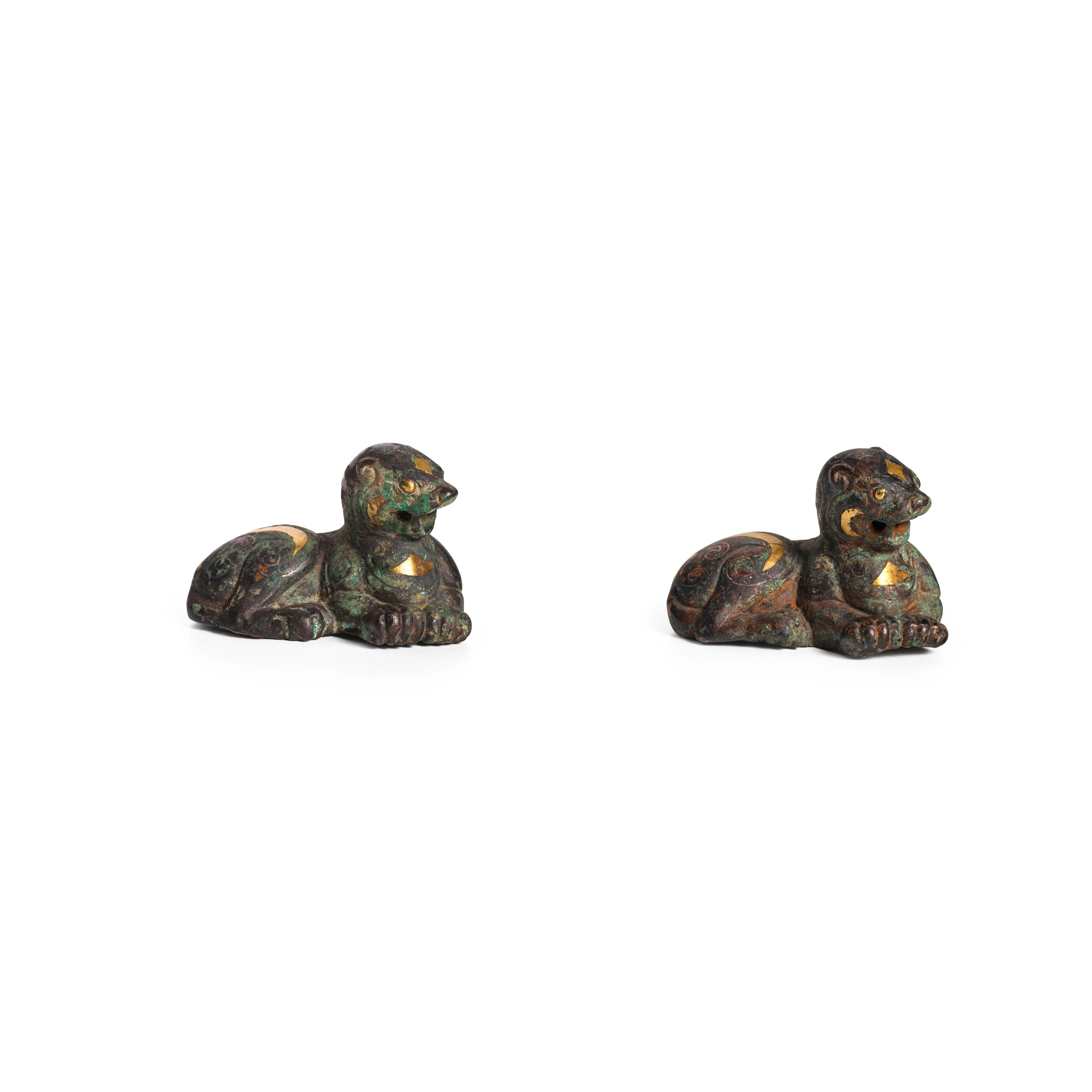 Bonhams : A PAIR OF INLAID AND GILDED BRONZE TIGER WEIGHTS Han dynasty