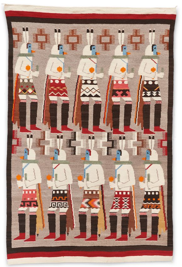Bonhams Skinner : A Navajo (Diné) Yei weaving 71 x 46 in.