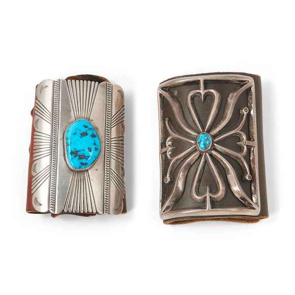 Bonhams Skinner : Two Navajo (Diné) bow guards 3 x 4, and 2 1/2 x 3 5/8 in.