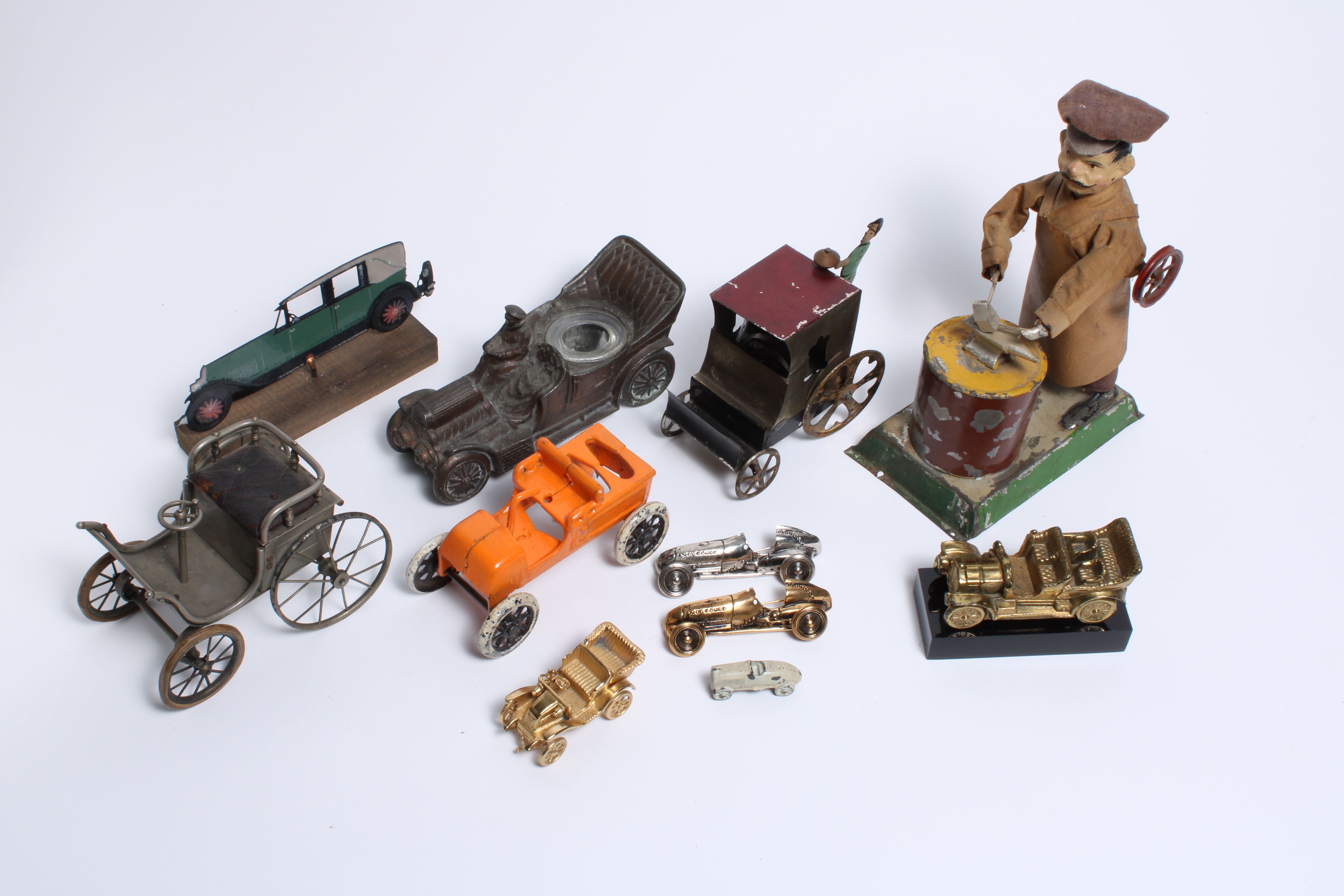 Bonhams Cars : Five early metal toys and models