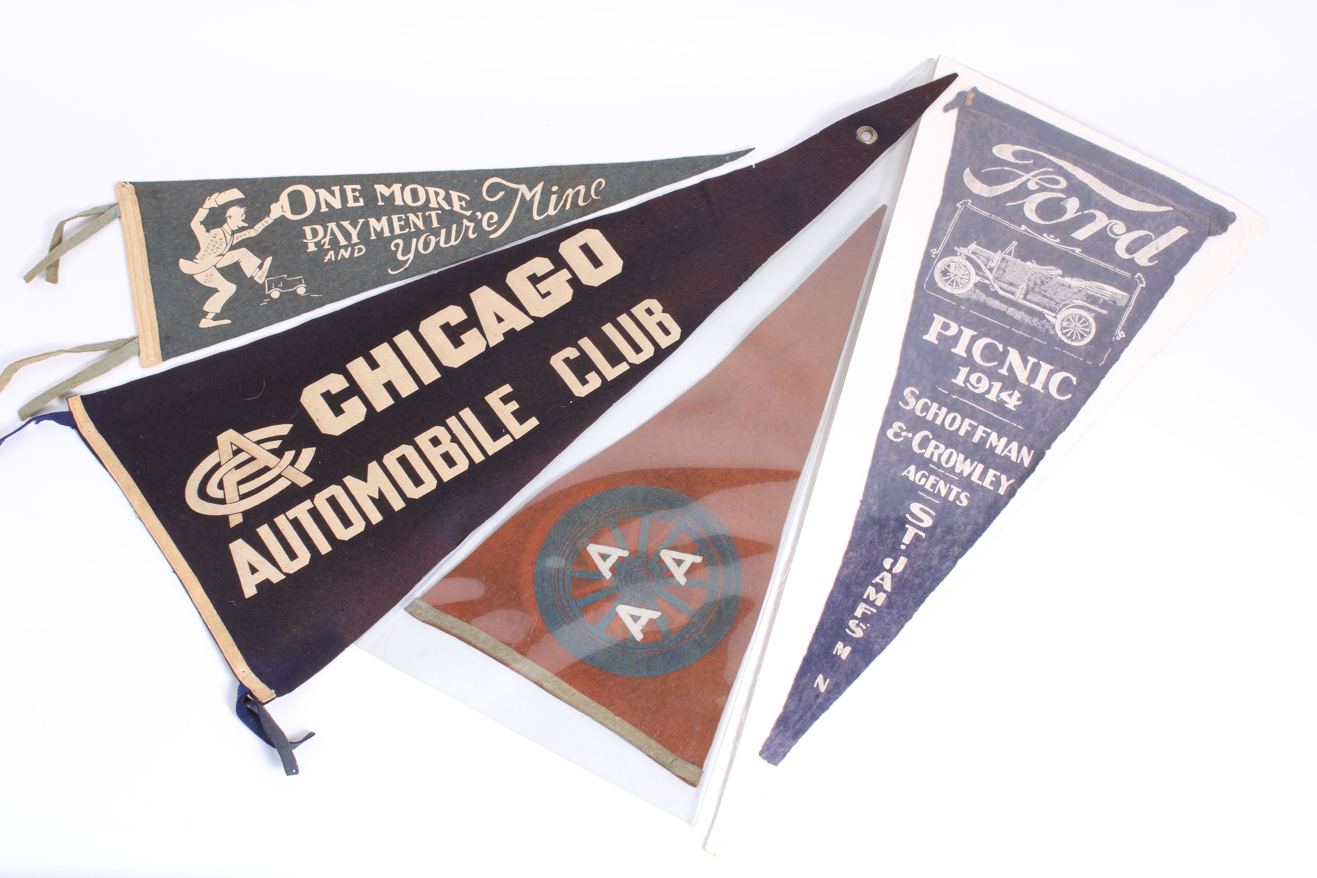 Bonhams Cars : Four assorted felt pennants, (4)
