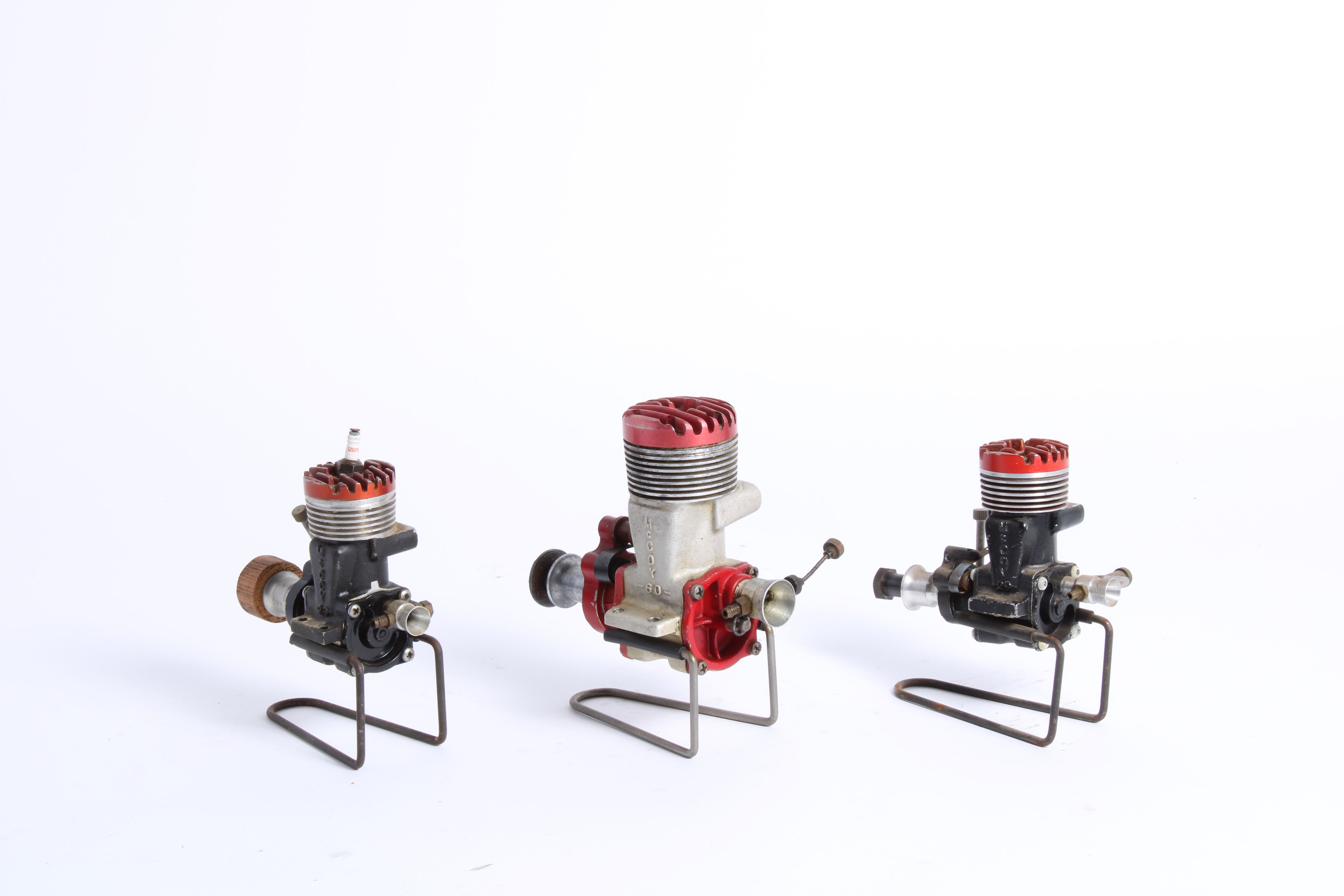 Bonhams Cars : Three McCoy 'red head' model engines, (3)