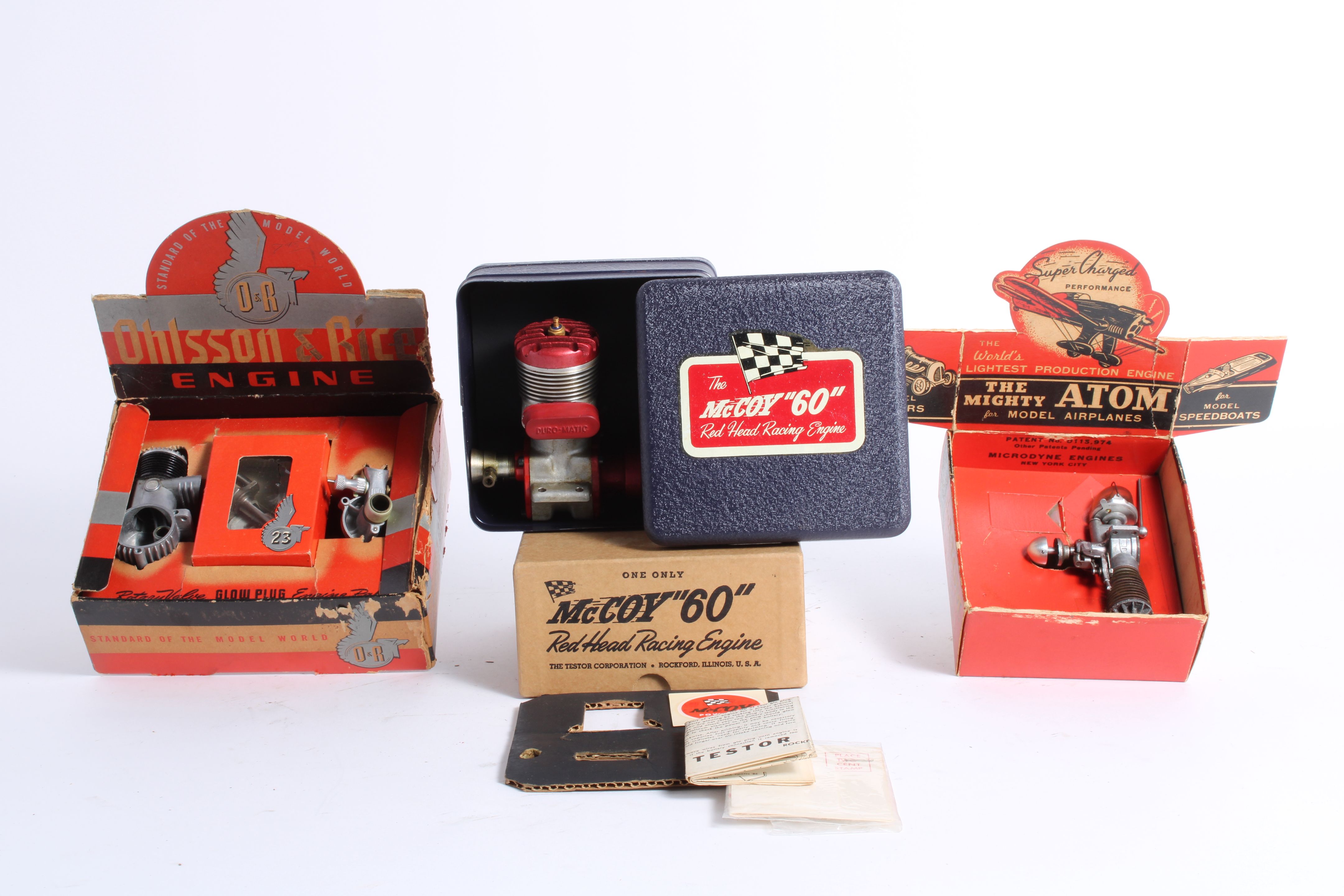 Bonhams Cars : Three gas powered miniature engines in trade boxes, (3)