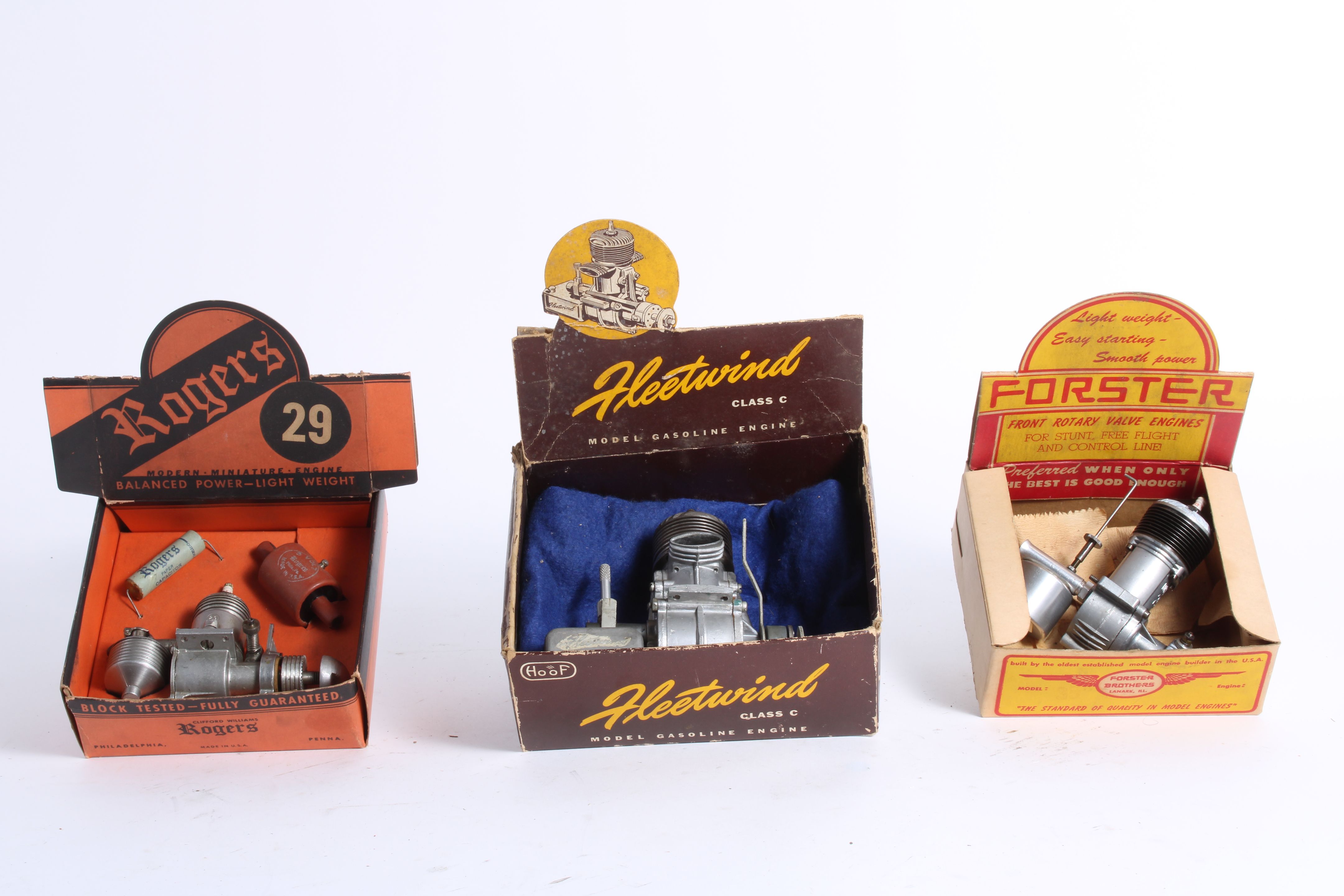 Bonhams Cars : Three gas powered miniature engines in trade boxes, (3)