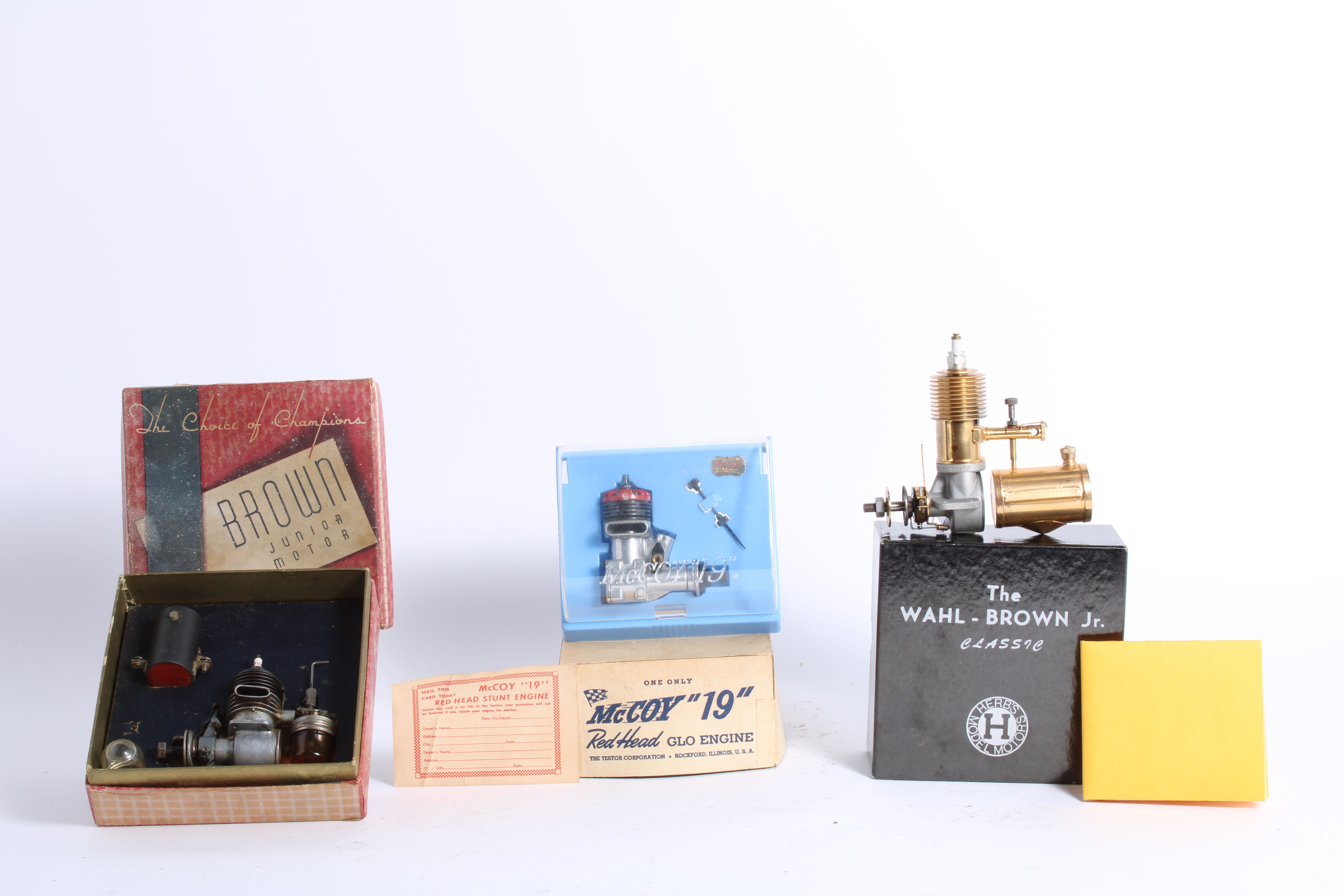 Bonhams Cars : Three gas powered miniature engines in trade boxes, (3)