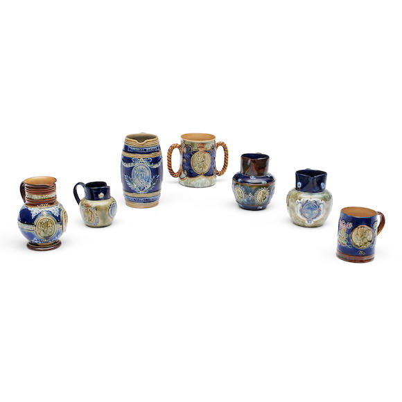 Bonhams Skinner Seven Doulton Glazed Stoneware Commemorative Jugs And