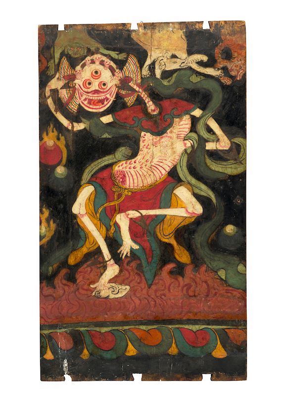 Bonhams : A PAINTED WOOD DOOR WITH A CHITIPATI FIGURE TIBET, 19TH CENTURY
