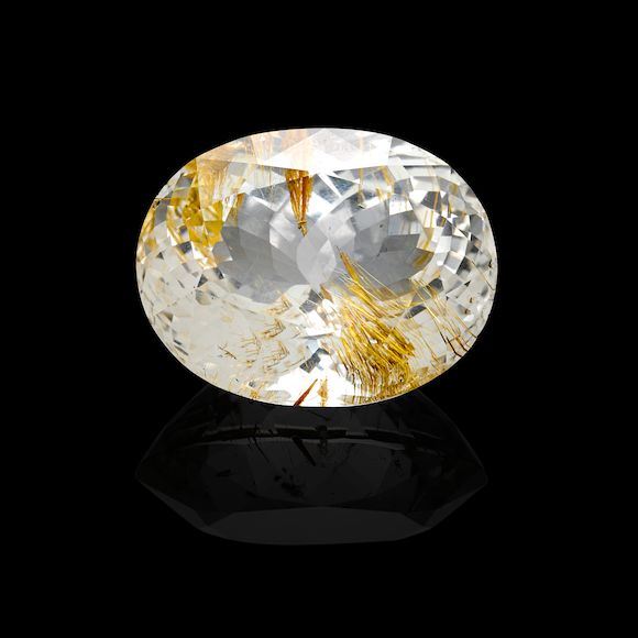 Bonhams : Limonite in Colorless Topaz--"A Member of the 100 Carats Club"