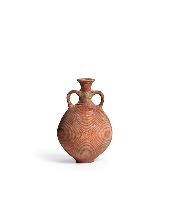 Bonhams : A MYCENAEAN POTTERY PILGRIM FLASKLate Helladic, circa 1375 ...